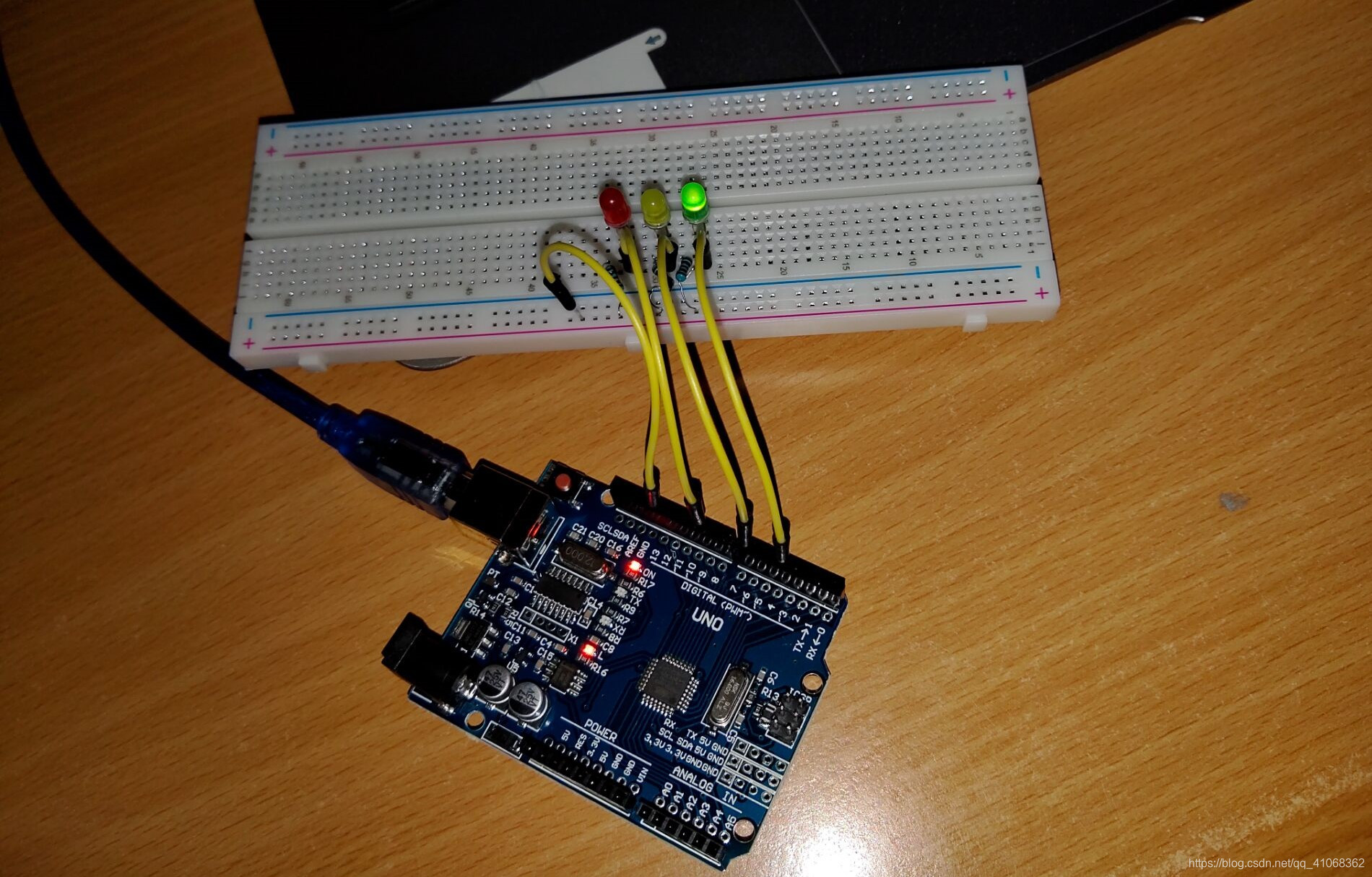 【物联网】arduino实现交通灯设计1 按照题目要求独立完成arduino程序设计。2显示南北两个方向的交通灯状态 Csdn博客