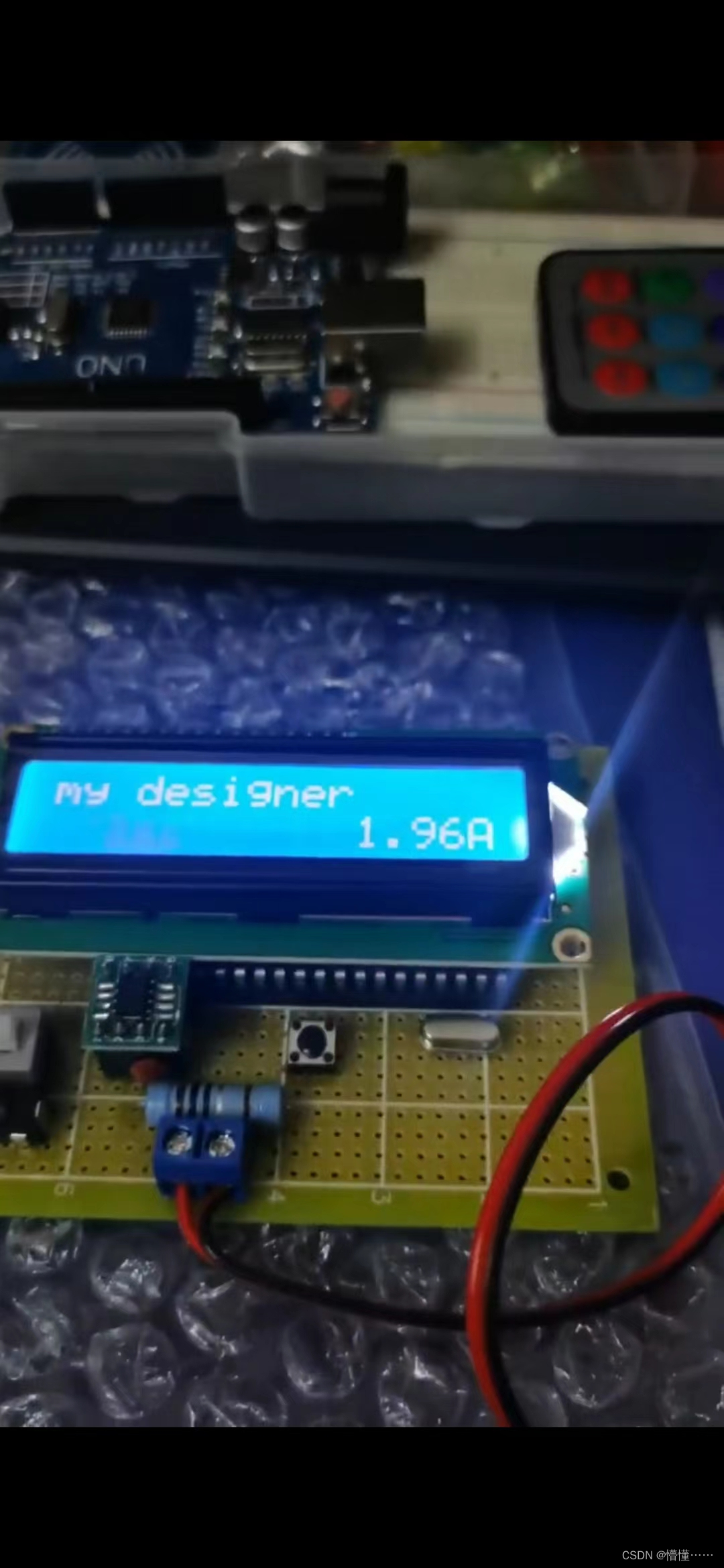 14、基于51单片机1602电流表检测设计(程序+原理图+Proteus仿真+参考论文+开题报告+任务书+元器件清单等)_基于单片机的电压电流表设计-CSDN博客